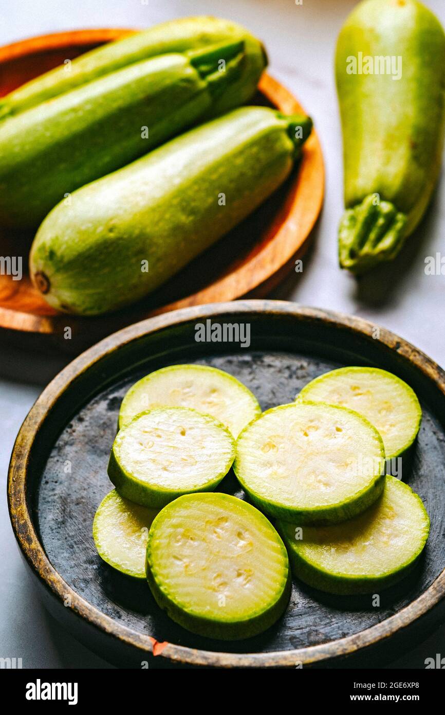 Bowl of Small Bright Green Fresh Zucchini or Courgettes – FOODPIX Stock ...