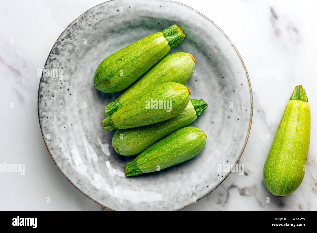 Bowl of Small Bright Green Fresh Zucchini or Courgettes – FOODPIX Stock ...