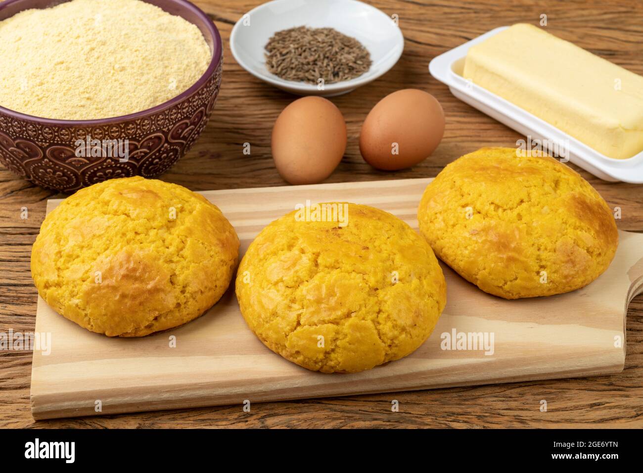 Broa, typical brazilian corn flour bread with ingredients. Butter, eggs ...