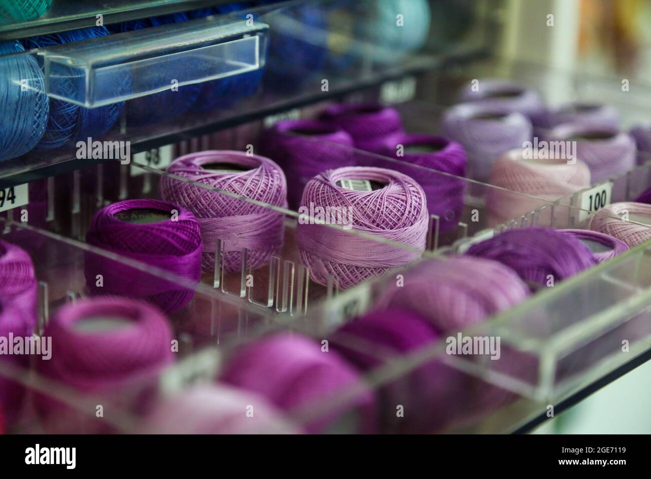 View of drawers and yarn displays of various colors and various types ...