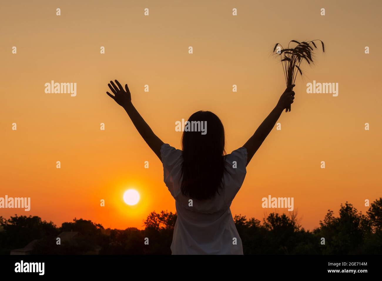 Girl Reaching Up To The Sky