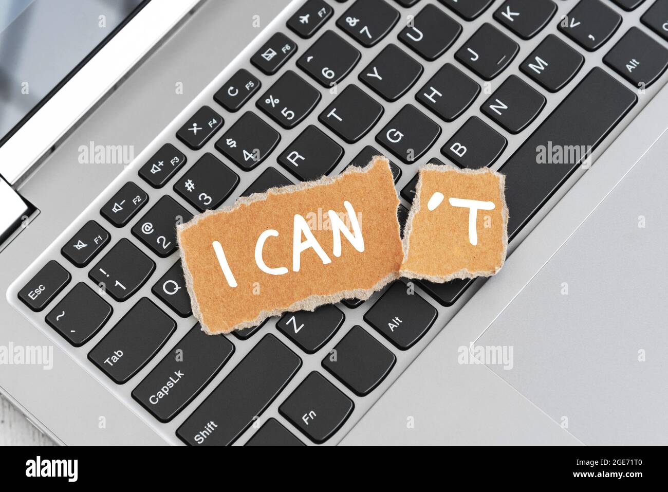 I can't text on torn paper on top of laptop keyboard Stock Photo - Alamy