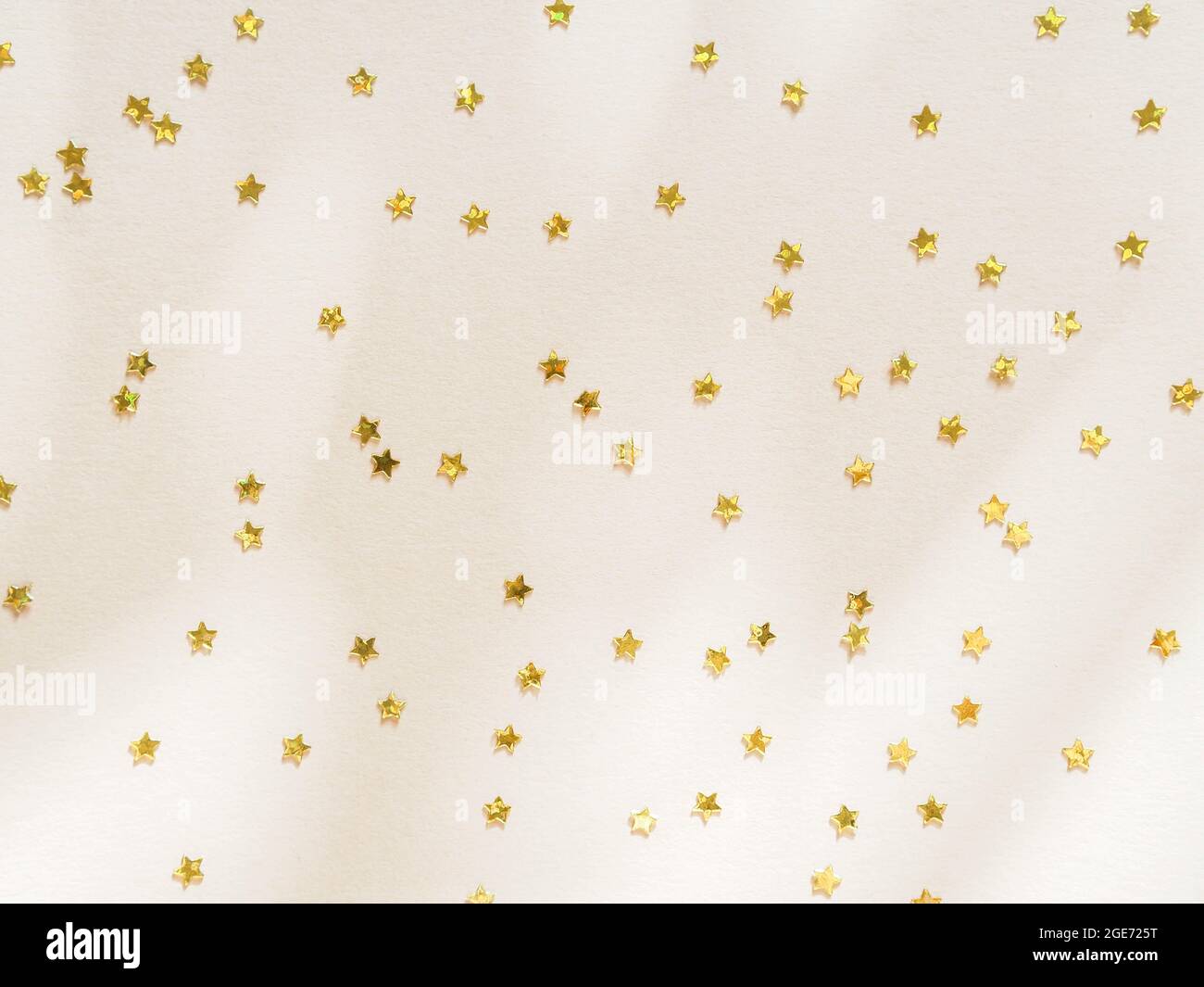 Party shiny decoration pattern - golden stars in the form of confetti ...
