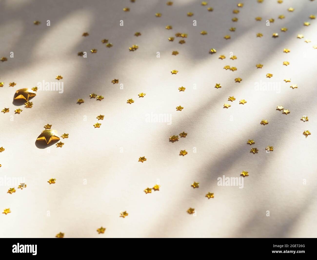 Party shiny decoration pattern - golden stars in the form of confetti ...