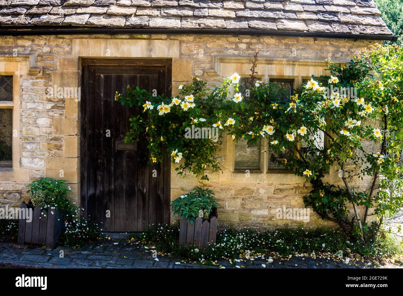A quaint old house in Castle Coombe, Wiltshire, UK Stock Photo - Alamy