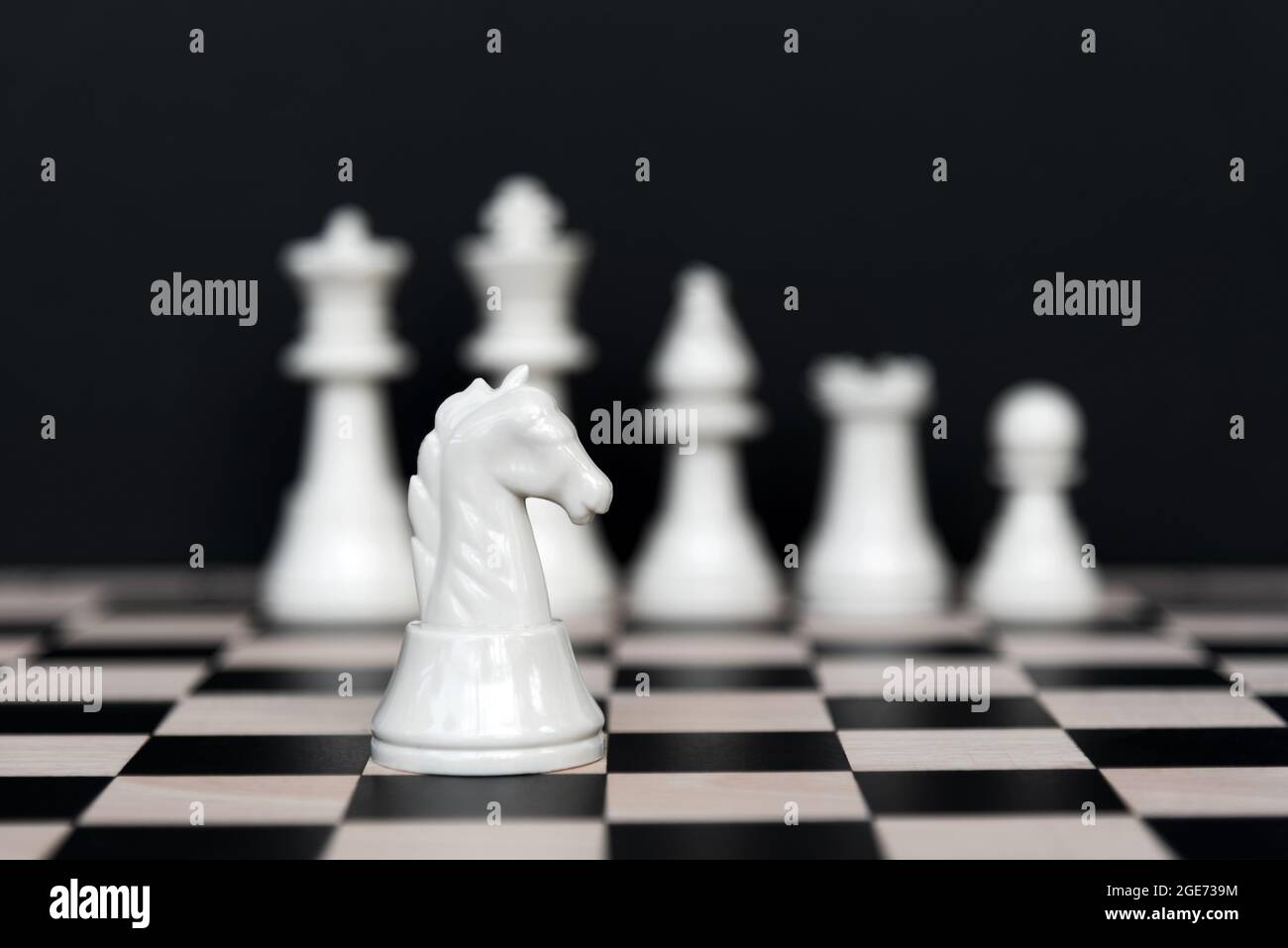 Protection concept - knight chess in front of other chess pieces on ...