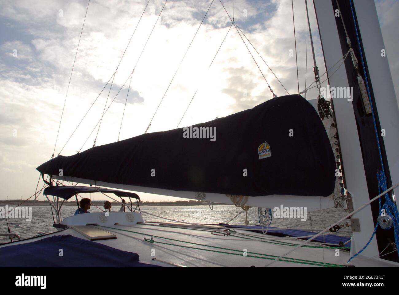 Large sail wrapped up Stock Photo - Alamy
