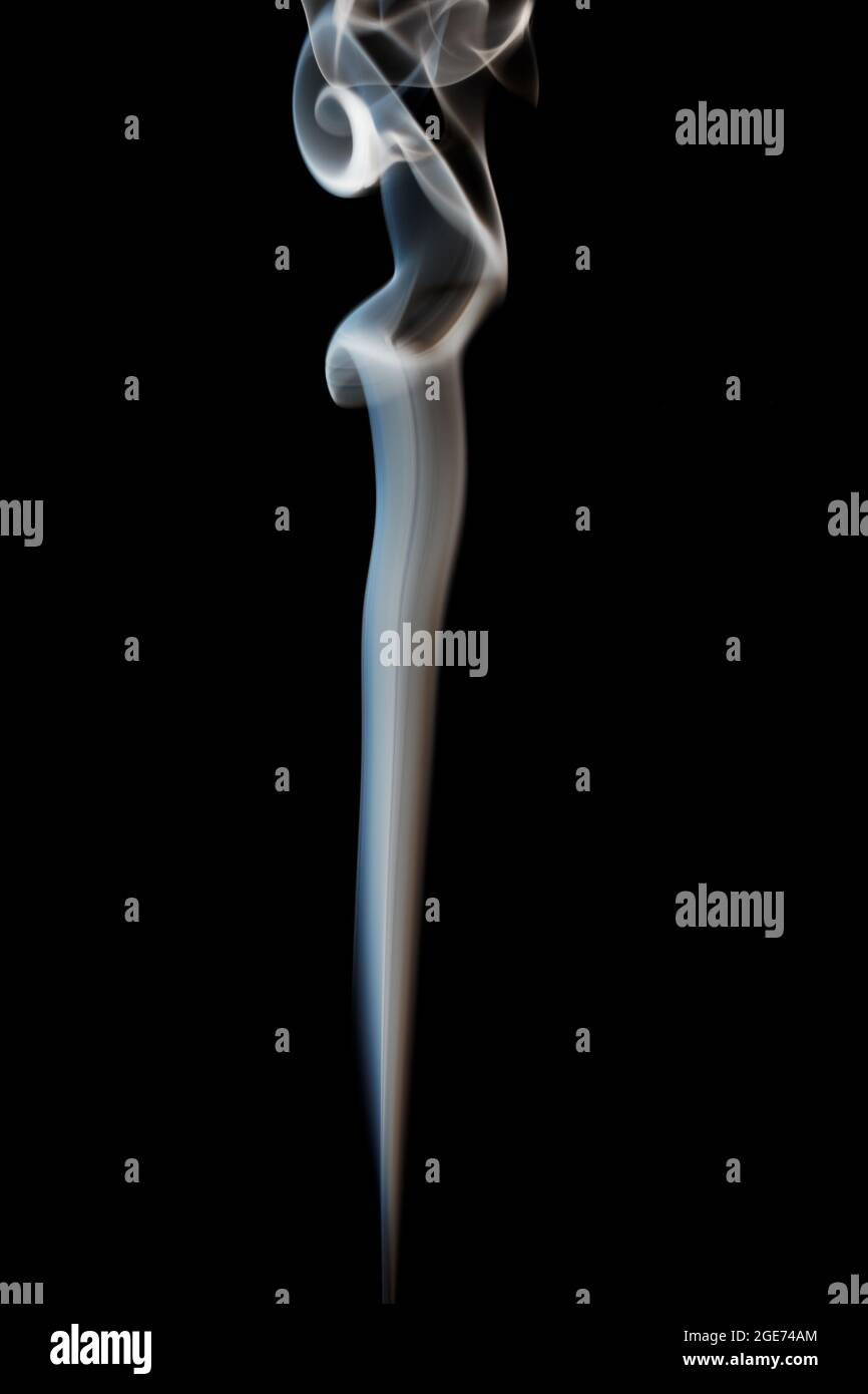 Close up of smoke or steam rising against black background Stock Photo ...