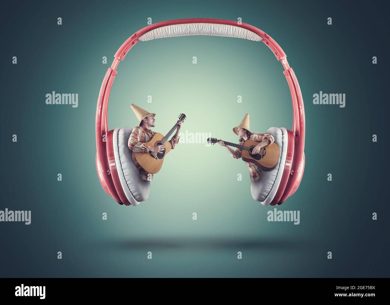 Two singers playing guitar in headphones Stock Photo - Alamy