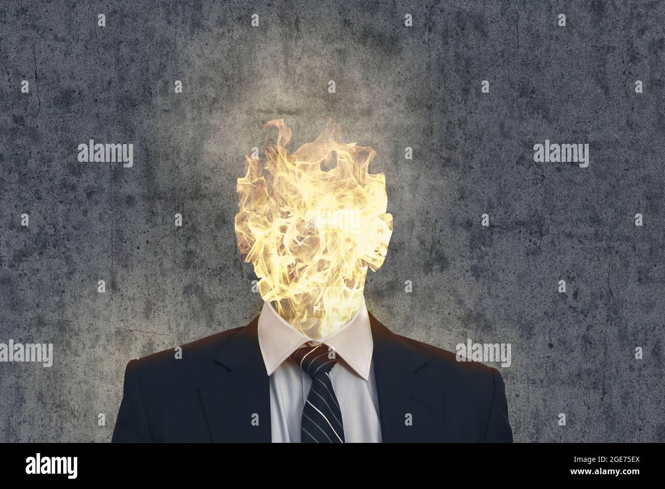 Business man with a flame head Stock Photo - Alamy