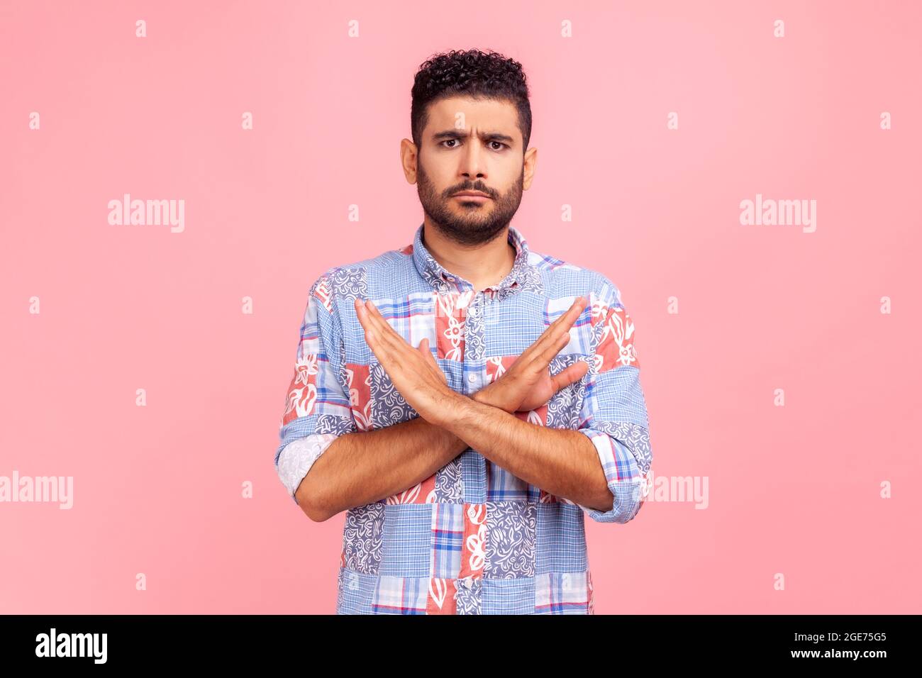 Never, no compromise! Portrait of dissatisfied bearded man in blue ...