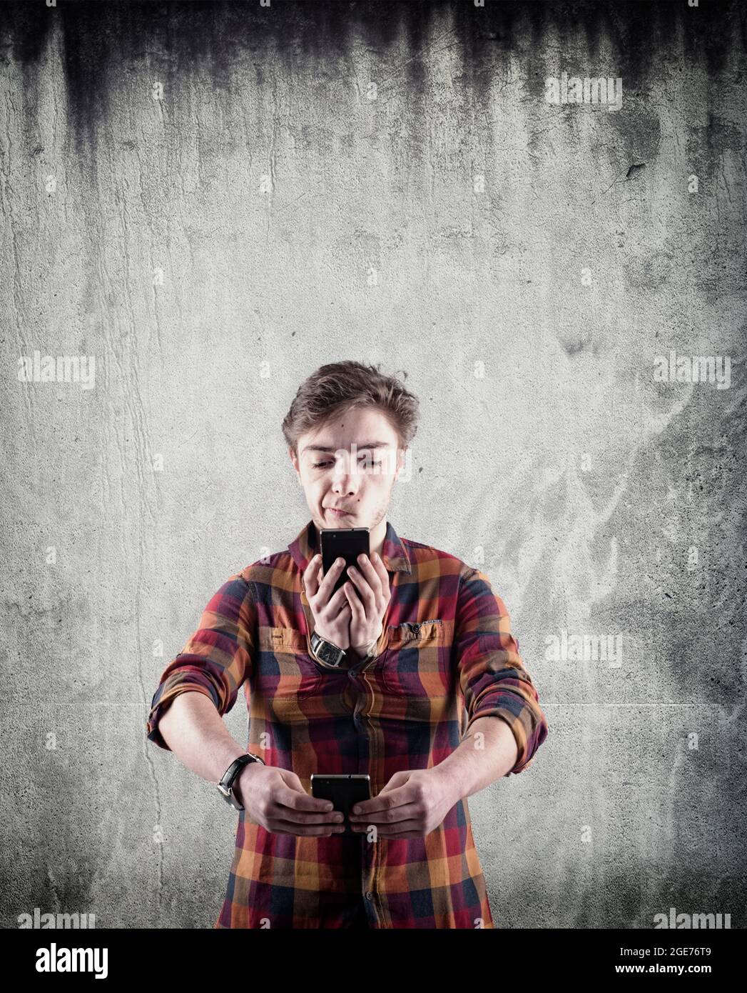 Using two phones hi-res stock photography and images - Alamy