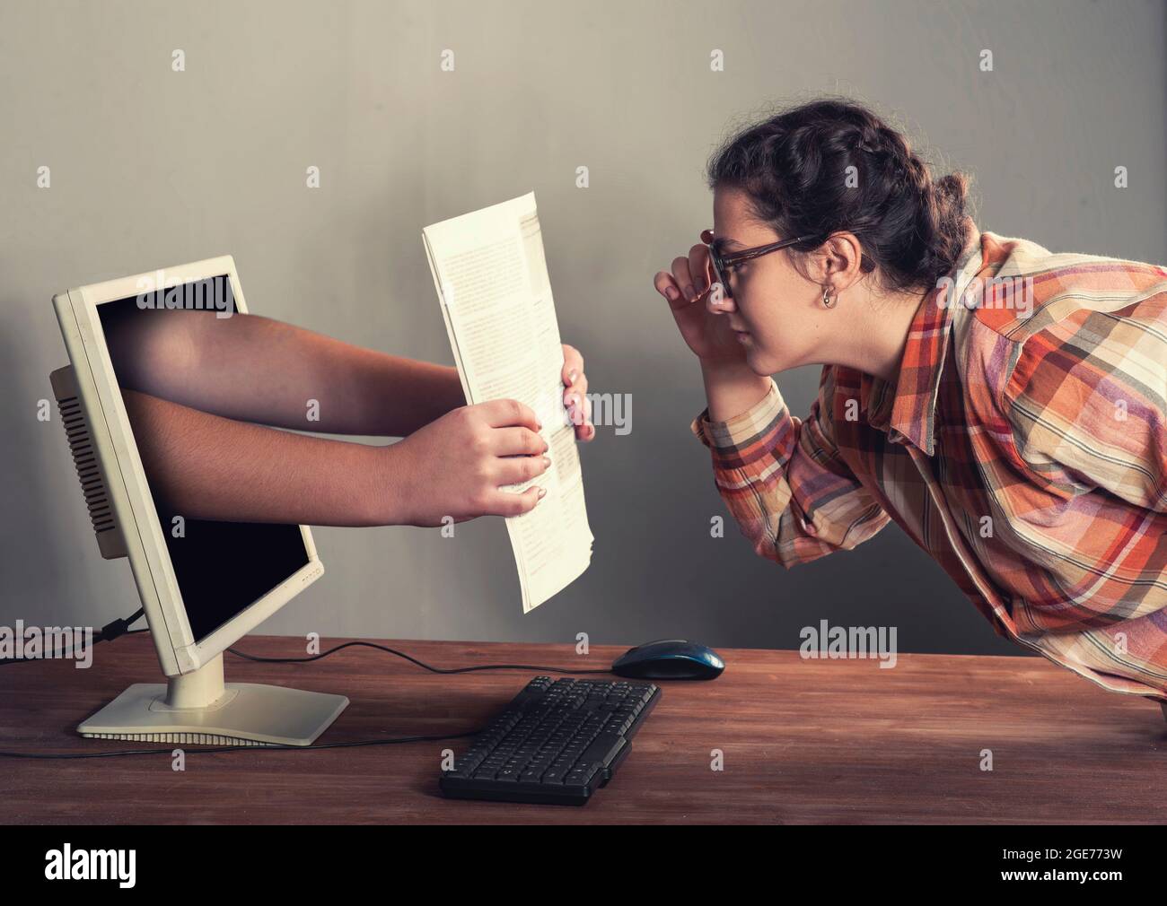 Hand reaching out of computer hi-res stock photography and images - Alamy