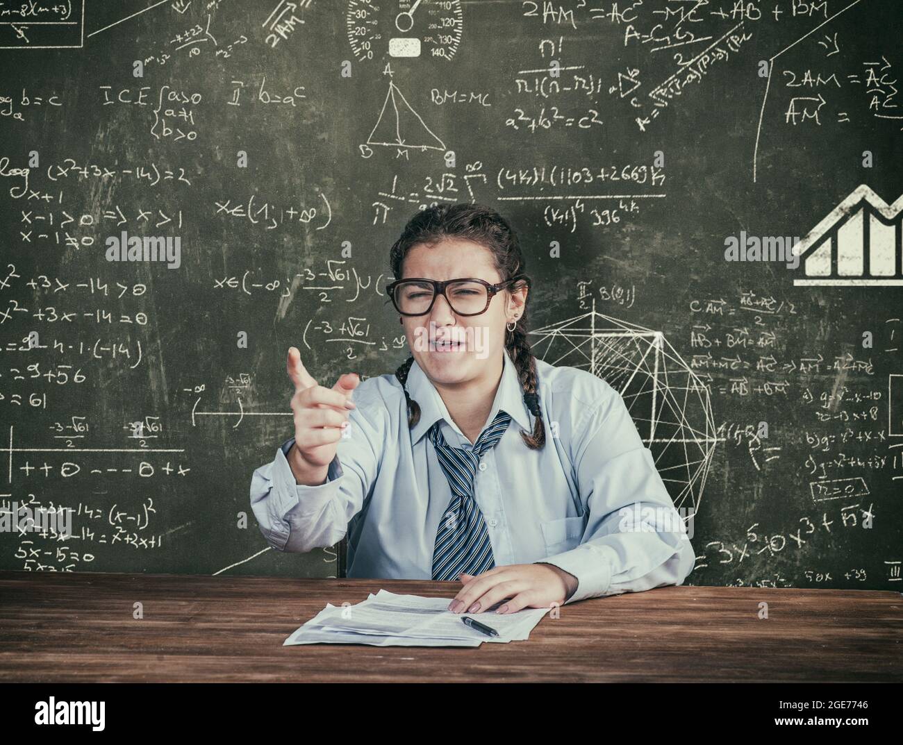 Teacher behind classroom hi-res stock photography and images - Alamy