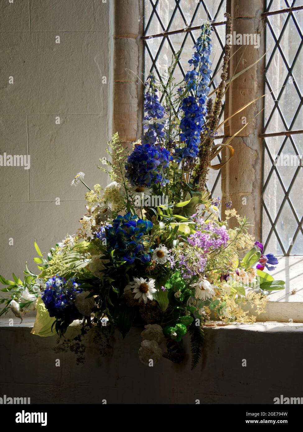 Flower arrangement in the window of the redundantt All Saints church in ...
