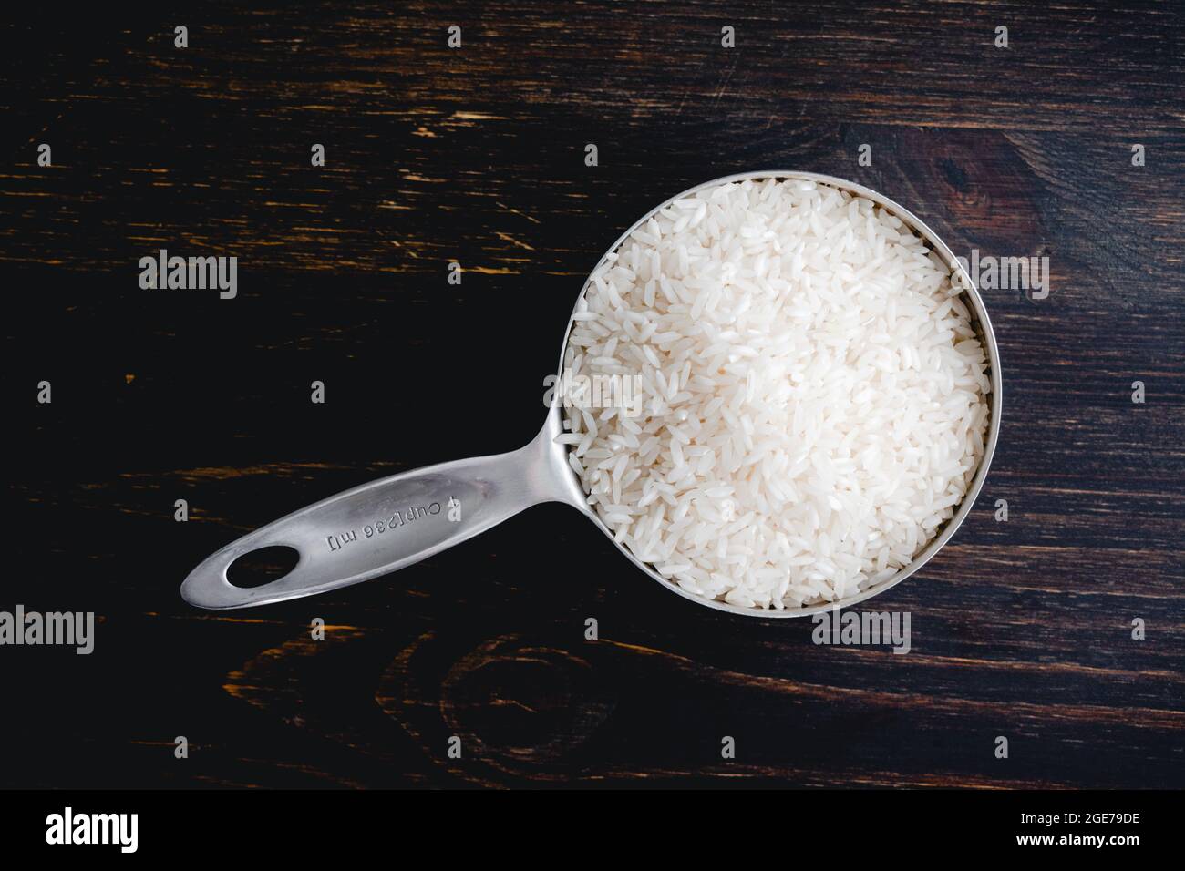 A Measuring Cup Full of Uncooked Long Grain Rice: A stainless steel ...