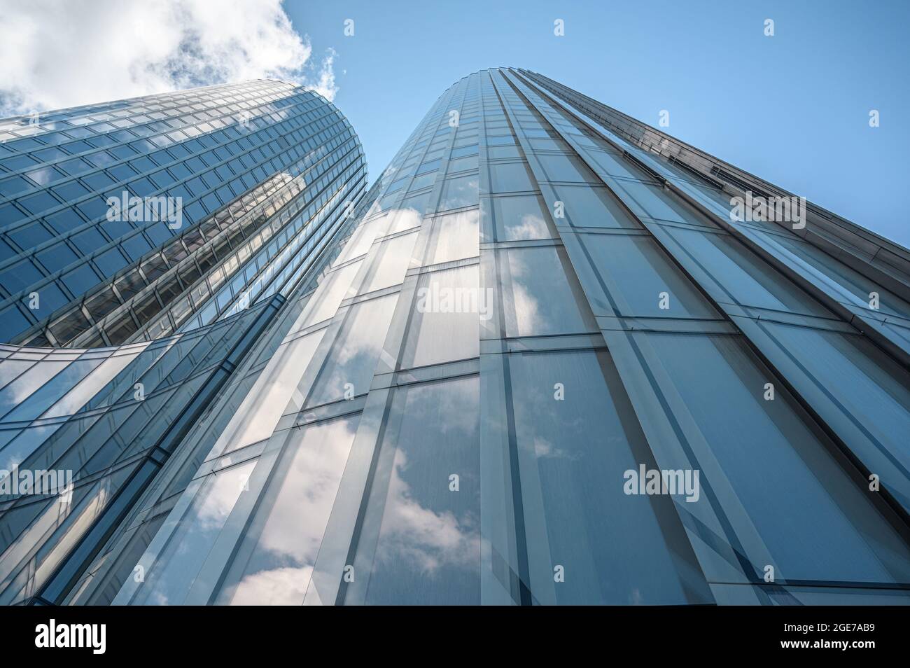 Abstract round blue skyscraper buildings. Skyscraper on a background of ...