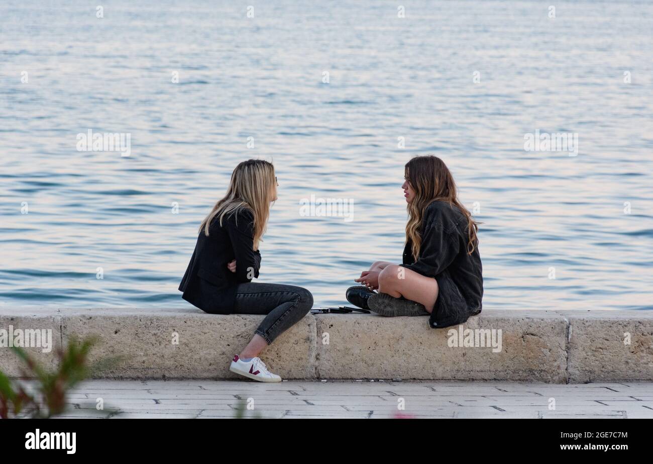 SPLIT, CROATIA - Jun 04, 2021: Gen-z friends having a conversation on ...