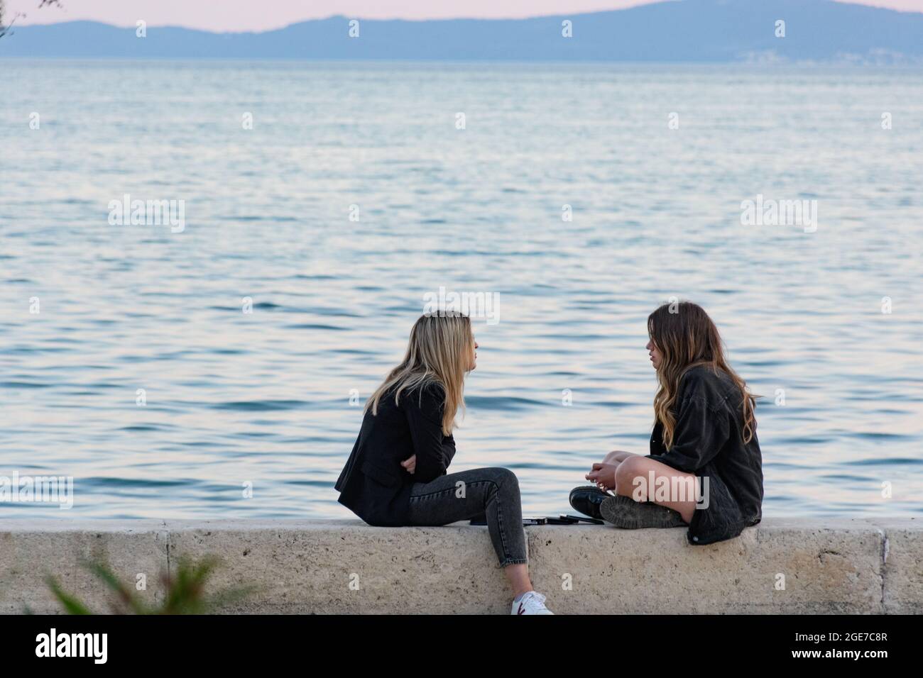SPLIT, CROATIA - Jun 04, 2021: Gen-z friends having a conversation on ...