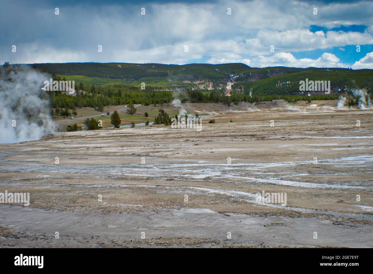 Beautiful landscape view with geothermal activity and a nearby car ...