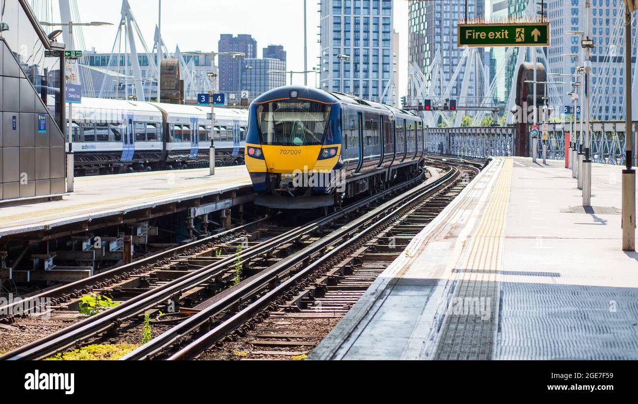 A 707 City Beam train leaves Charing Cross station. The train is one of ...
