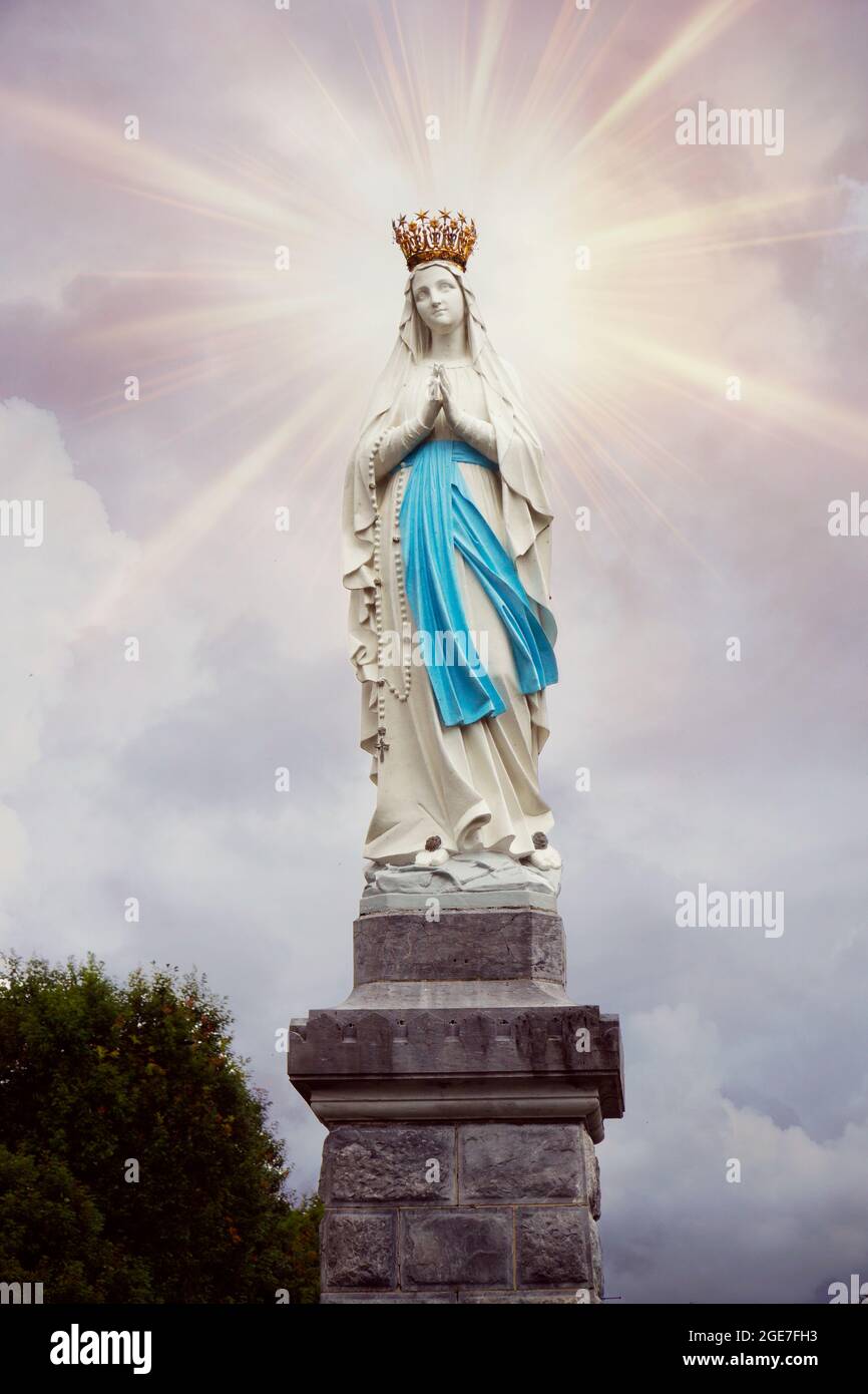 The statue of Virgin Mary in the sanctuary of Lourdes, France, one of ...