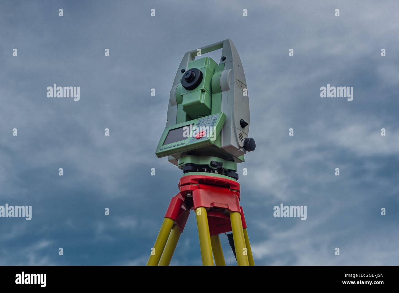 Machine for surveyors with blue sky and green trees in sunny color day ...