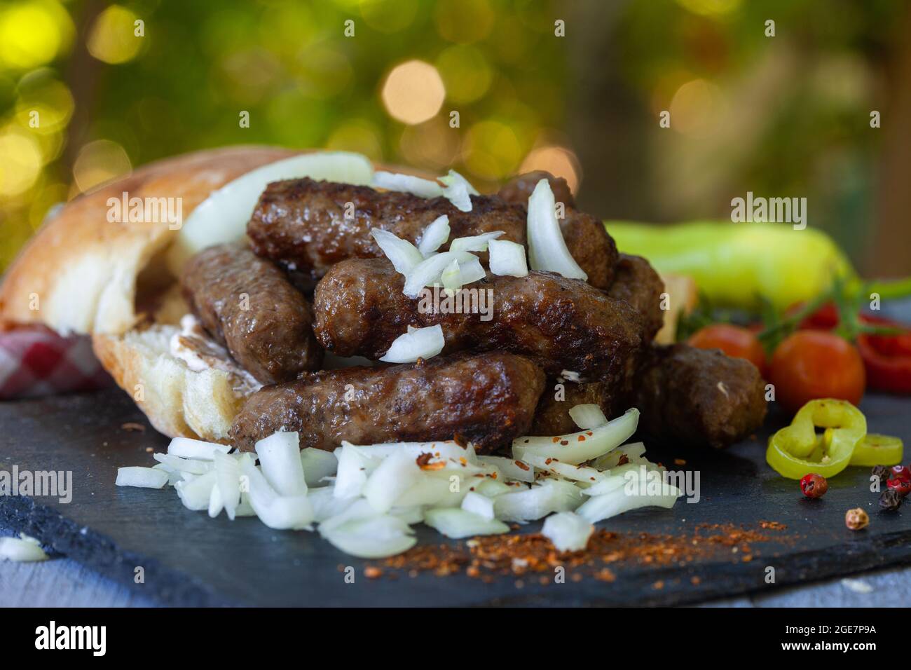 Grilled kebab, turkish style barbecued minced meat with onion ...
