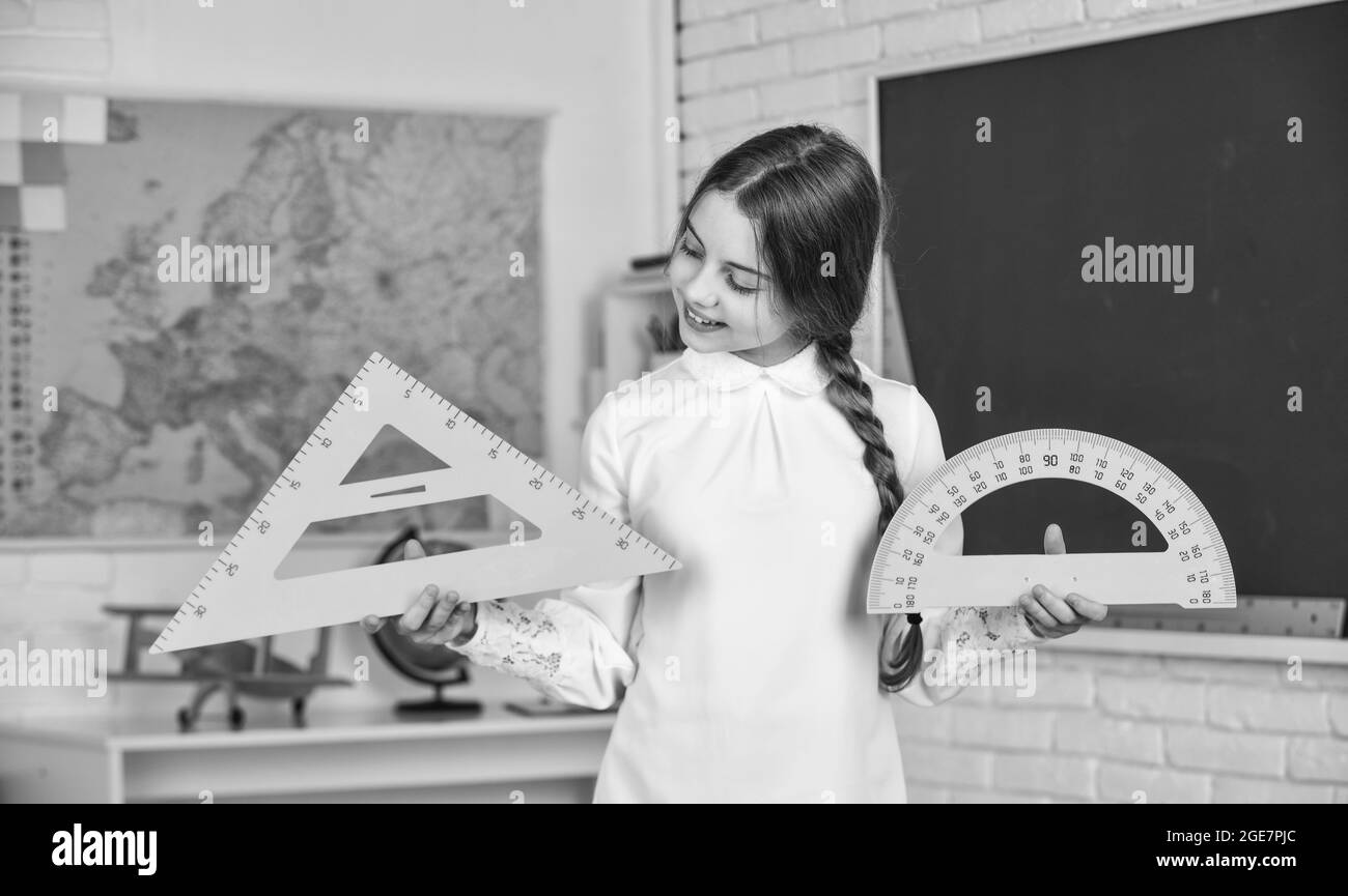 school lesson items. High school student learning geometry in class ...