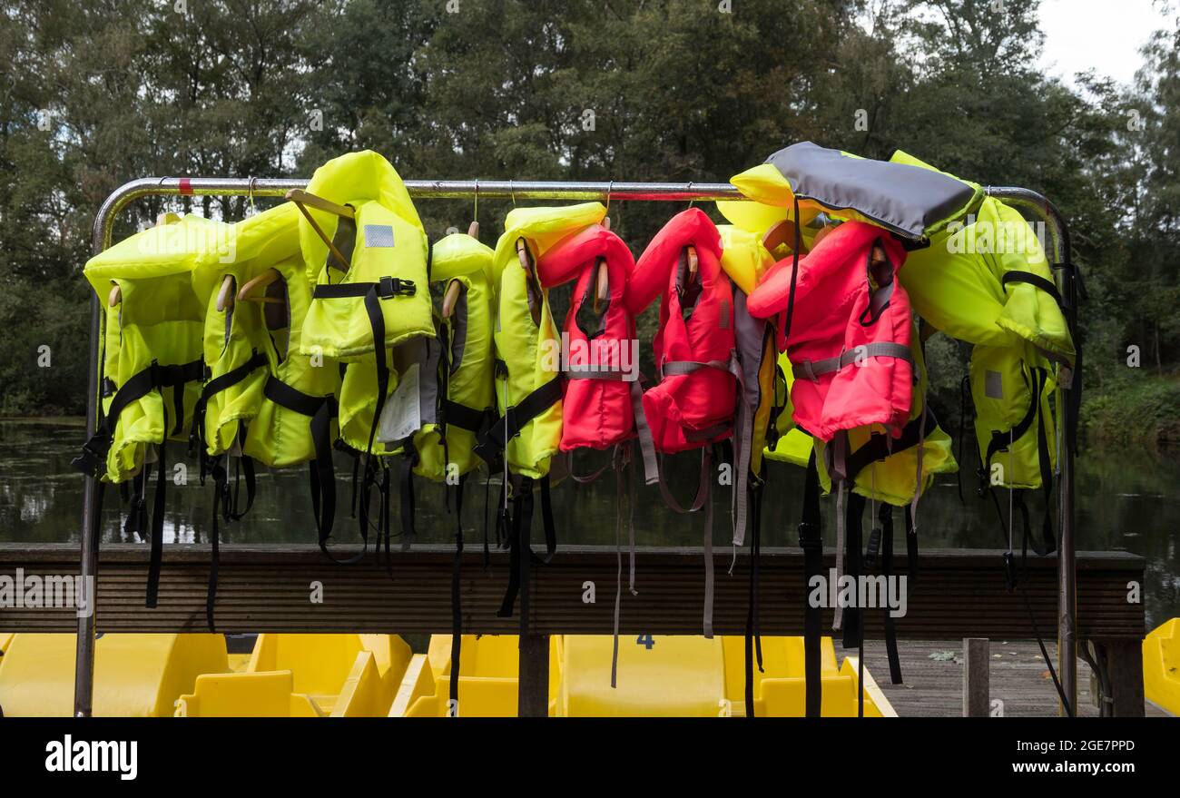 red and yellow life jackets Stock Photo - Alamy