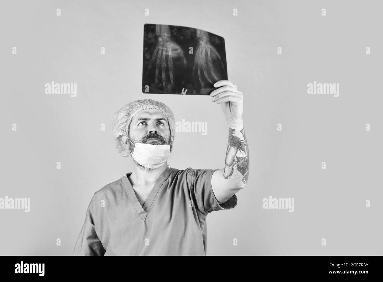 Surgery operation and medical concept. man look at roentgen ...