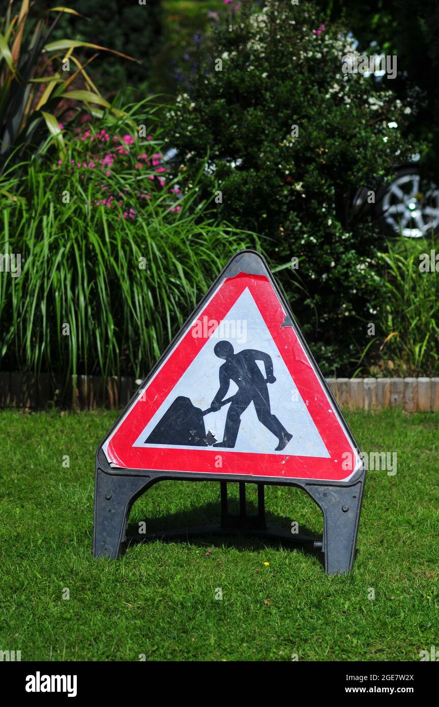 Work in road traffic signs in England UK Stock Photo - Alamy