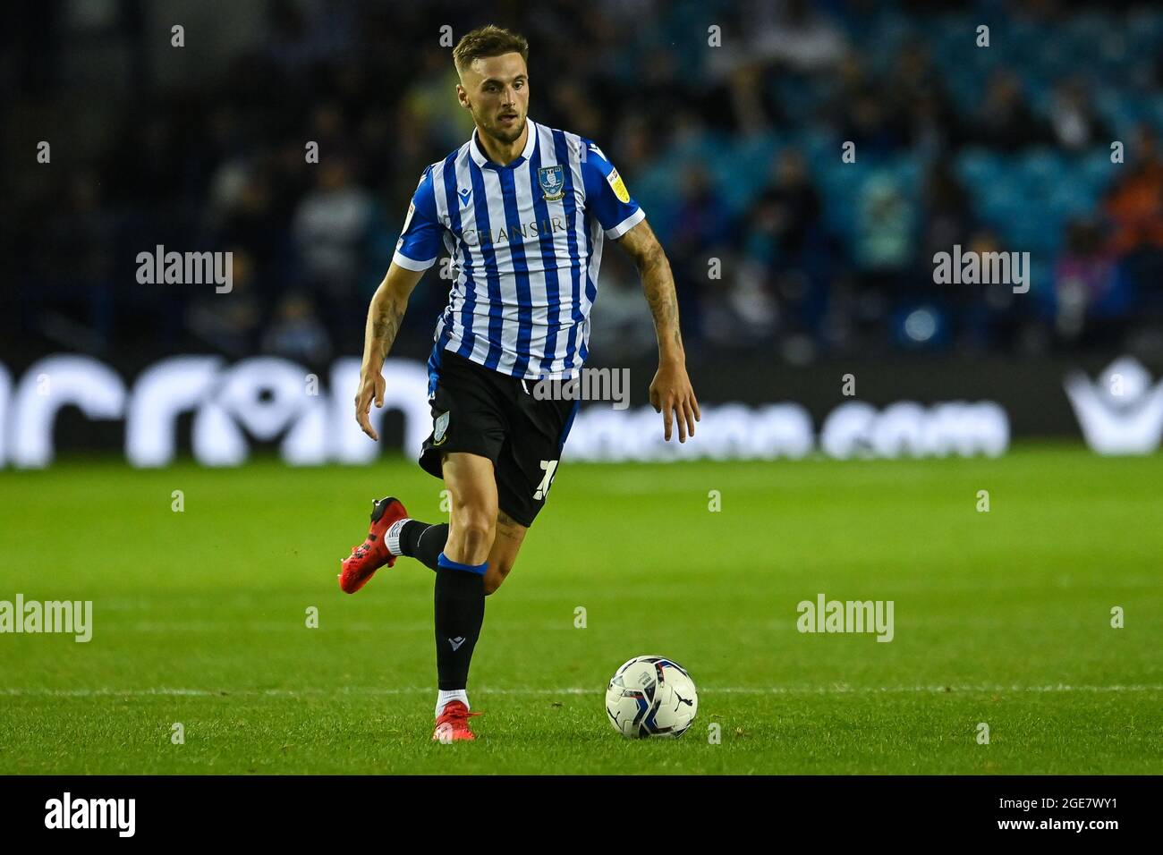 Lewis Wing #26 of Sheffield Wednesday makes a break with the ball Stock ...
