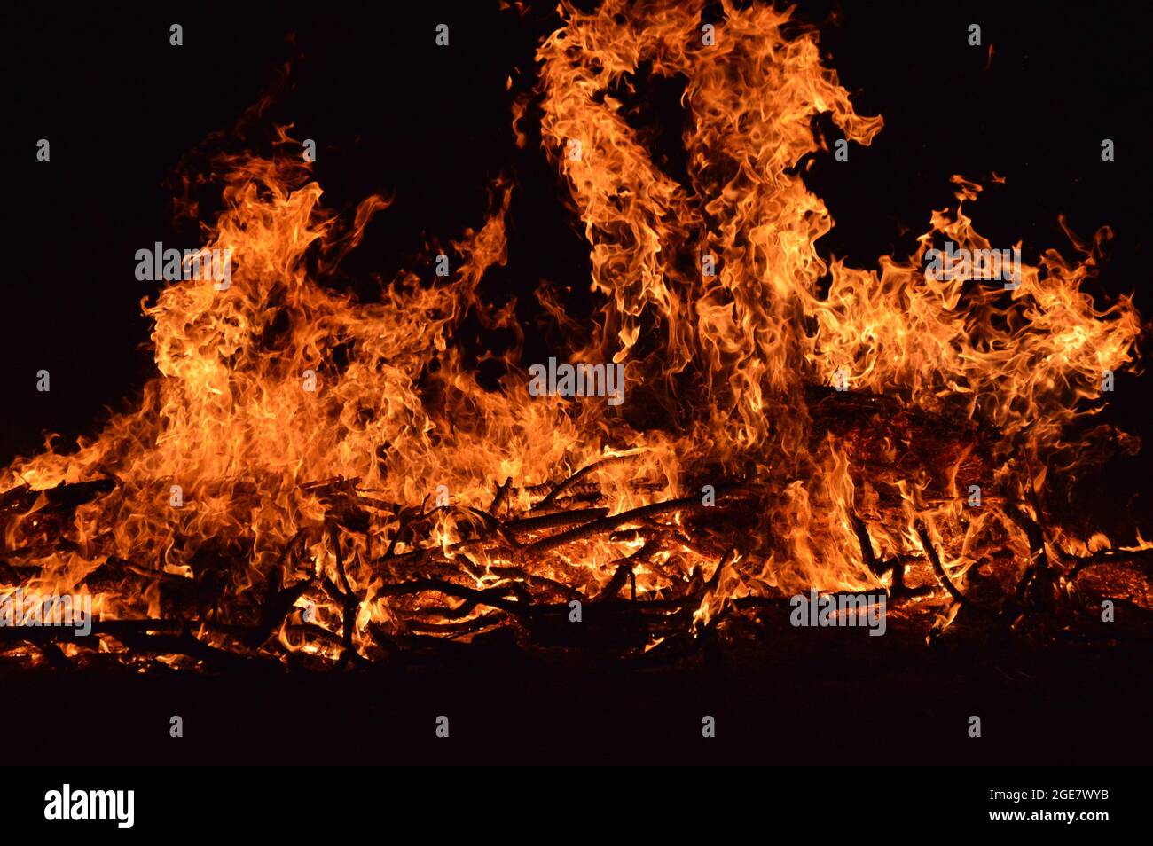 Closeup of fire flames in a darkness Stock Photo - Alamy