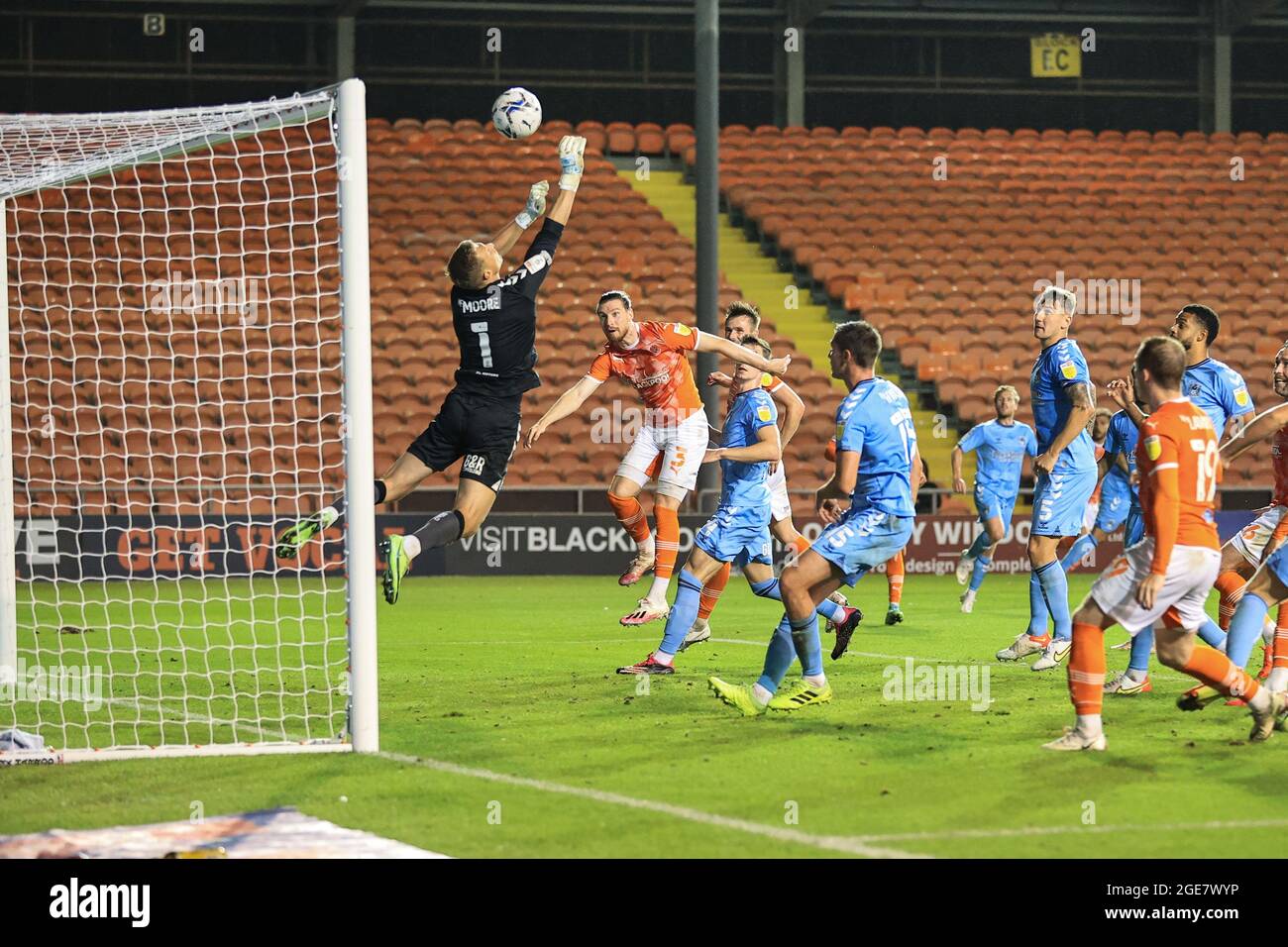 Simon Moore #1 of Coventry City saves Luke Garbutt #29 of Blackpool’s ...