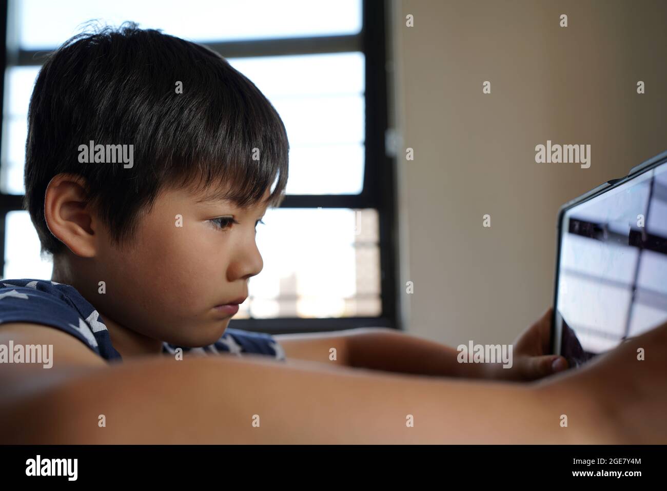 tween on tablet Stock Photo - Alamy
