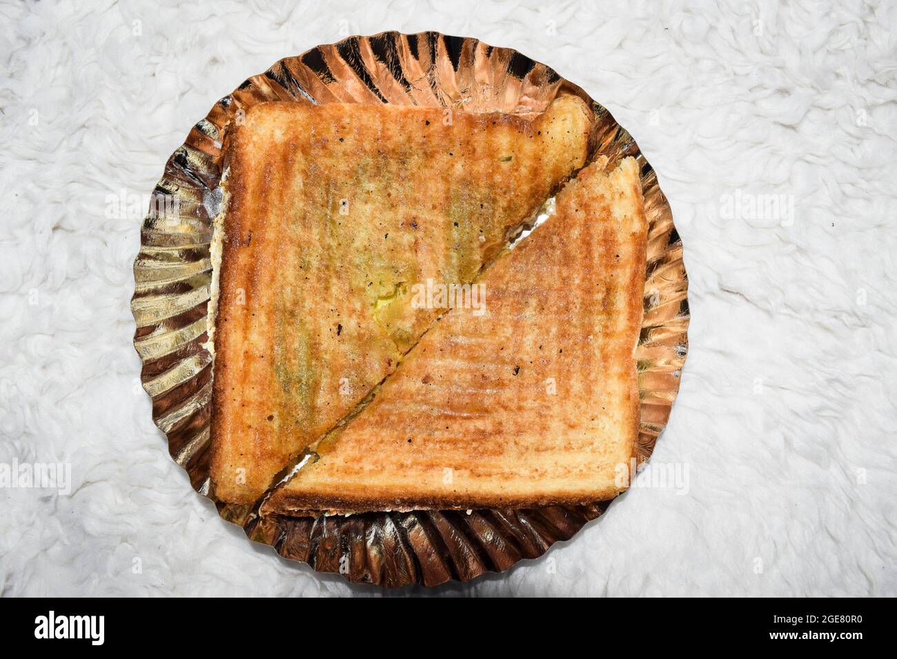 Cheese veg grilled sandwich toasted grill Breakfast item top view in ...