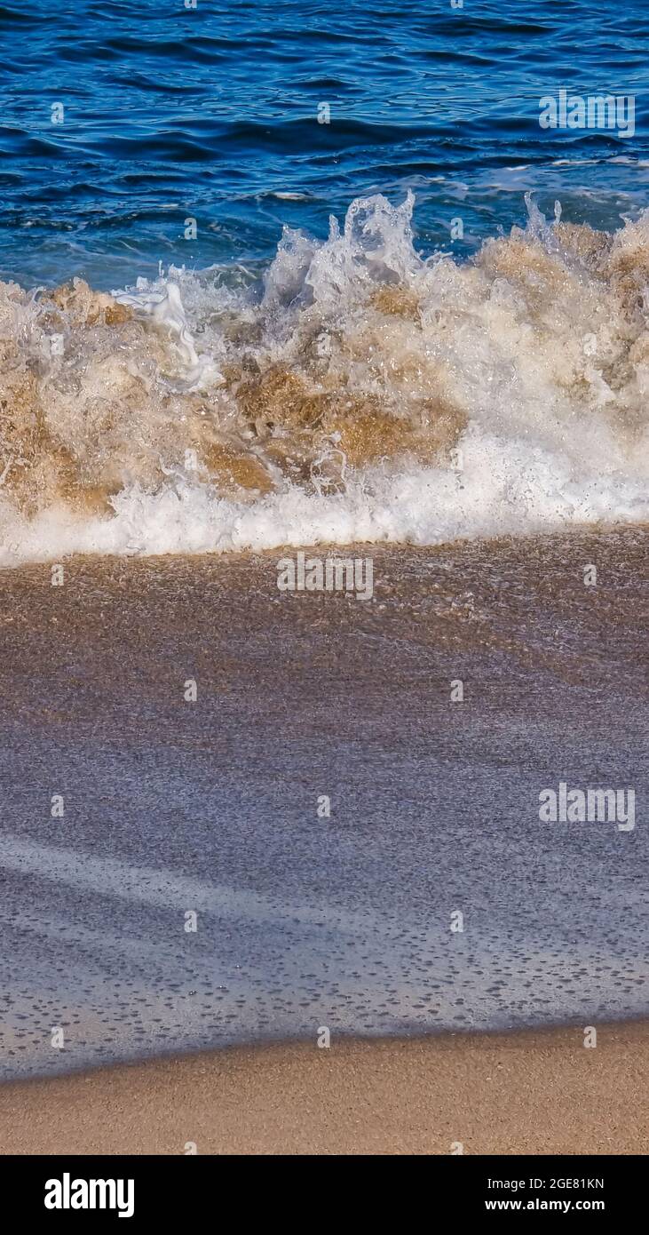 Sea waves ending at the beach Stock Photo - Alamy