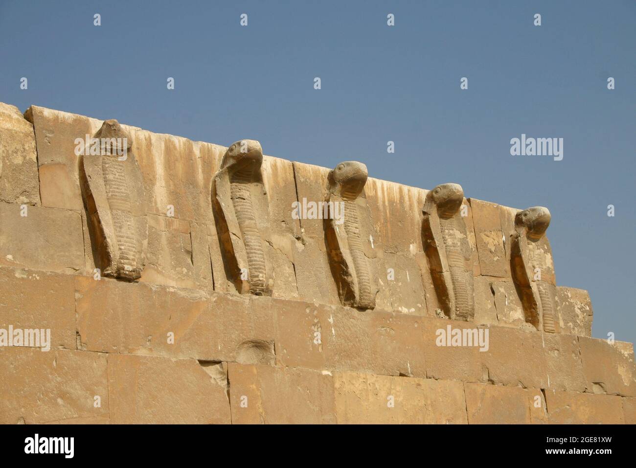 Snake detail on sphinx at Giza pyramids Stock Photo - Alamy