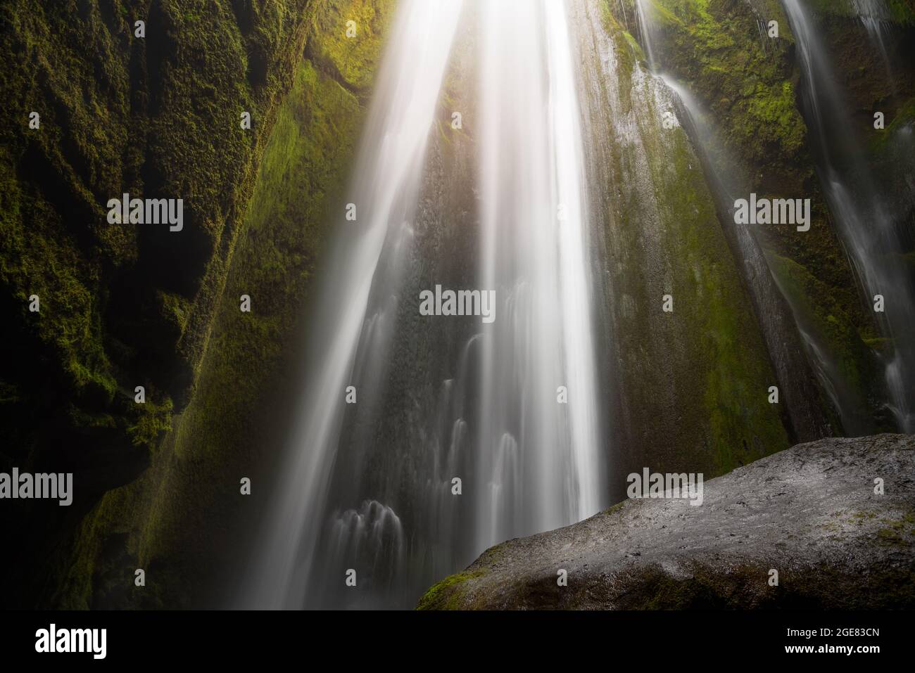 Beautiful waterfall in a narrow canyon Stock Photo - Alamy