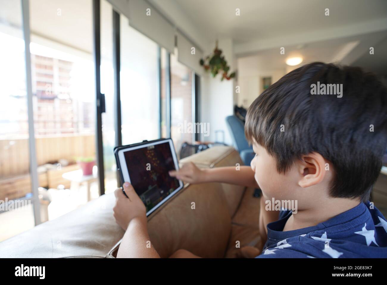 tween on tablet Stock Photo - Alamy
