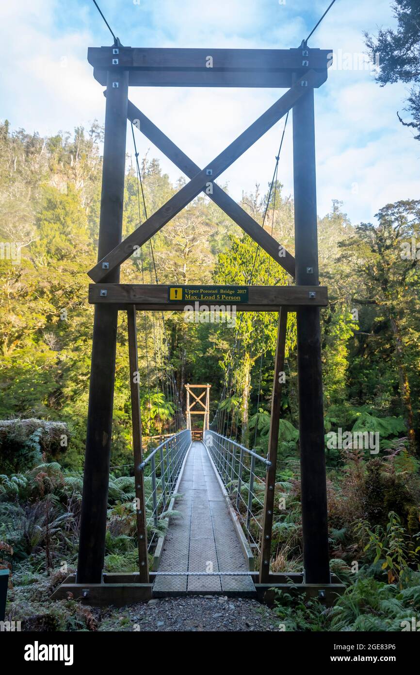 Suspension bridge over Pororari River, Paparoa Track, (one of NZ's ...