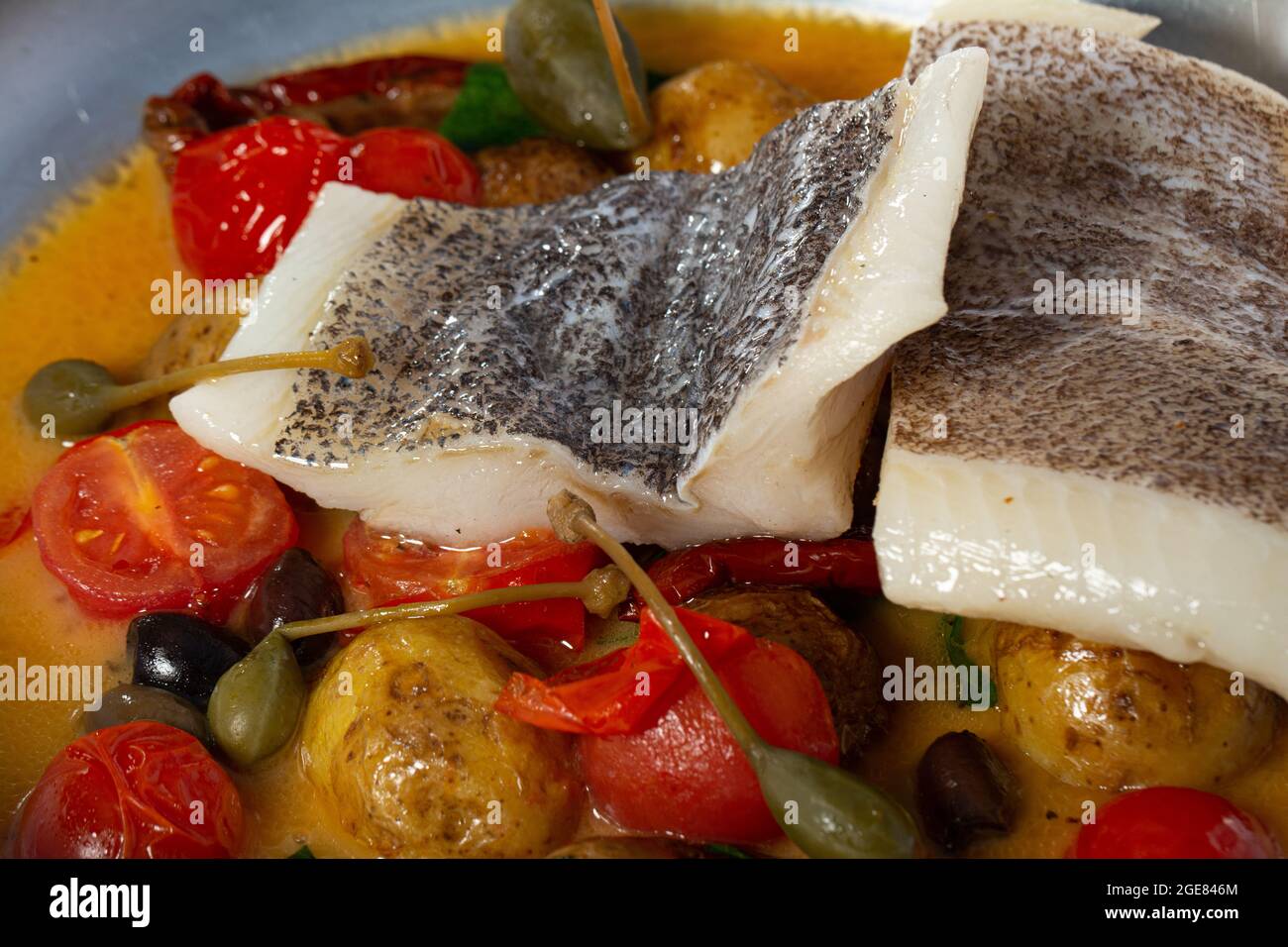 Pan fried halibut garnished with fennel seeds and spicy mustard sauce ...