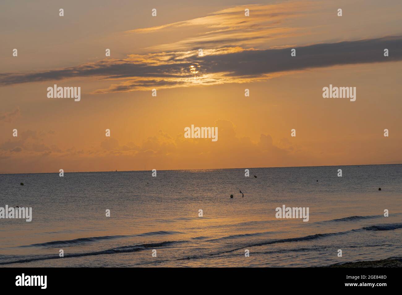 Langrune-Sur-Mer, France - 08 03 2021: Sunrise over the sea from the ...