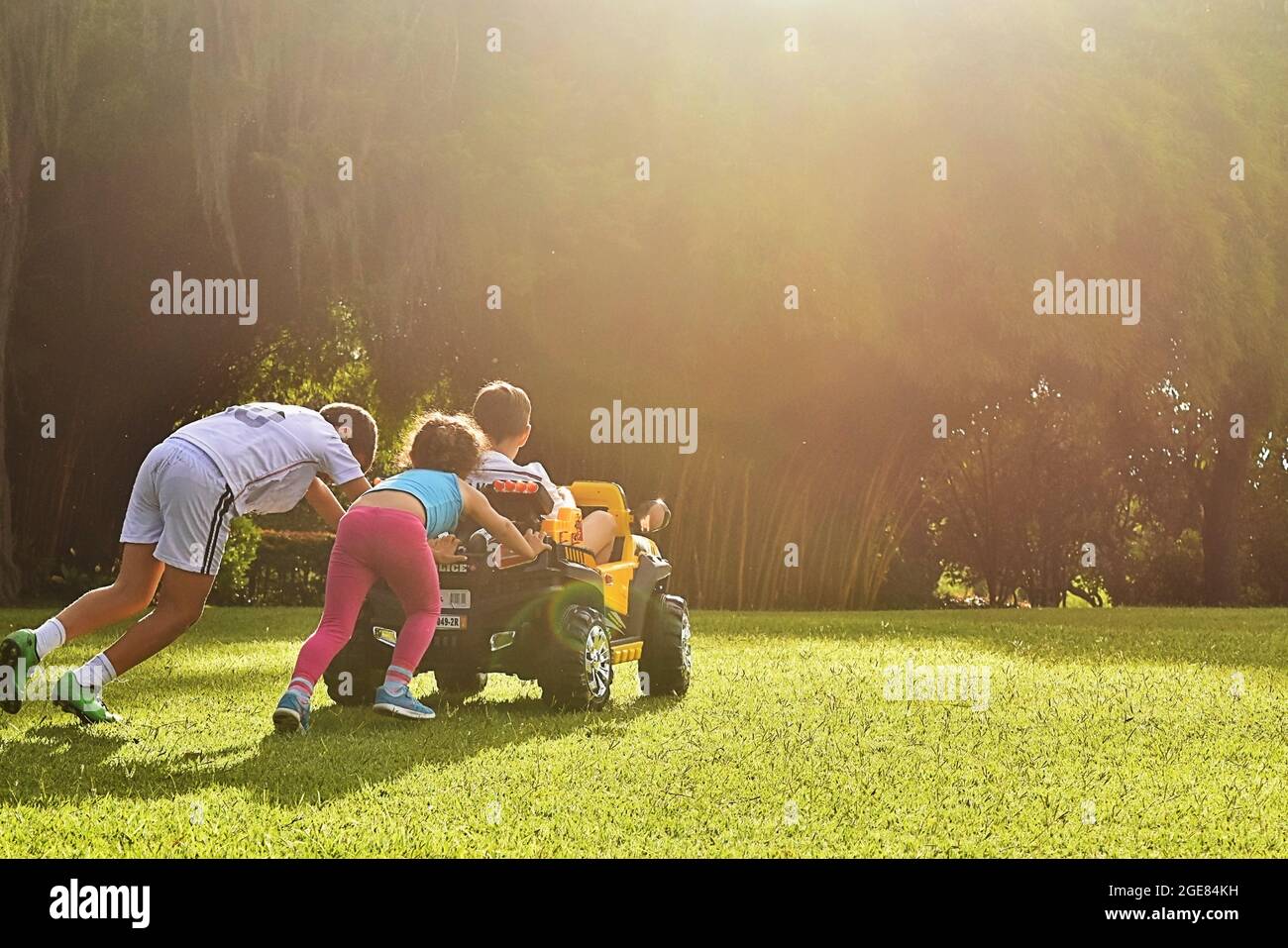 Child pushing a toy car hi-res stock photography and images - Alamy