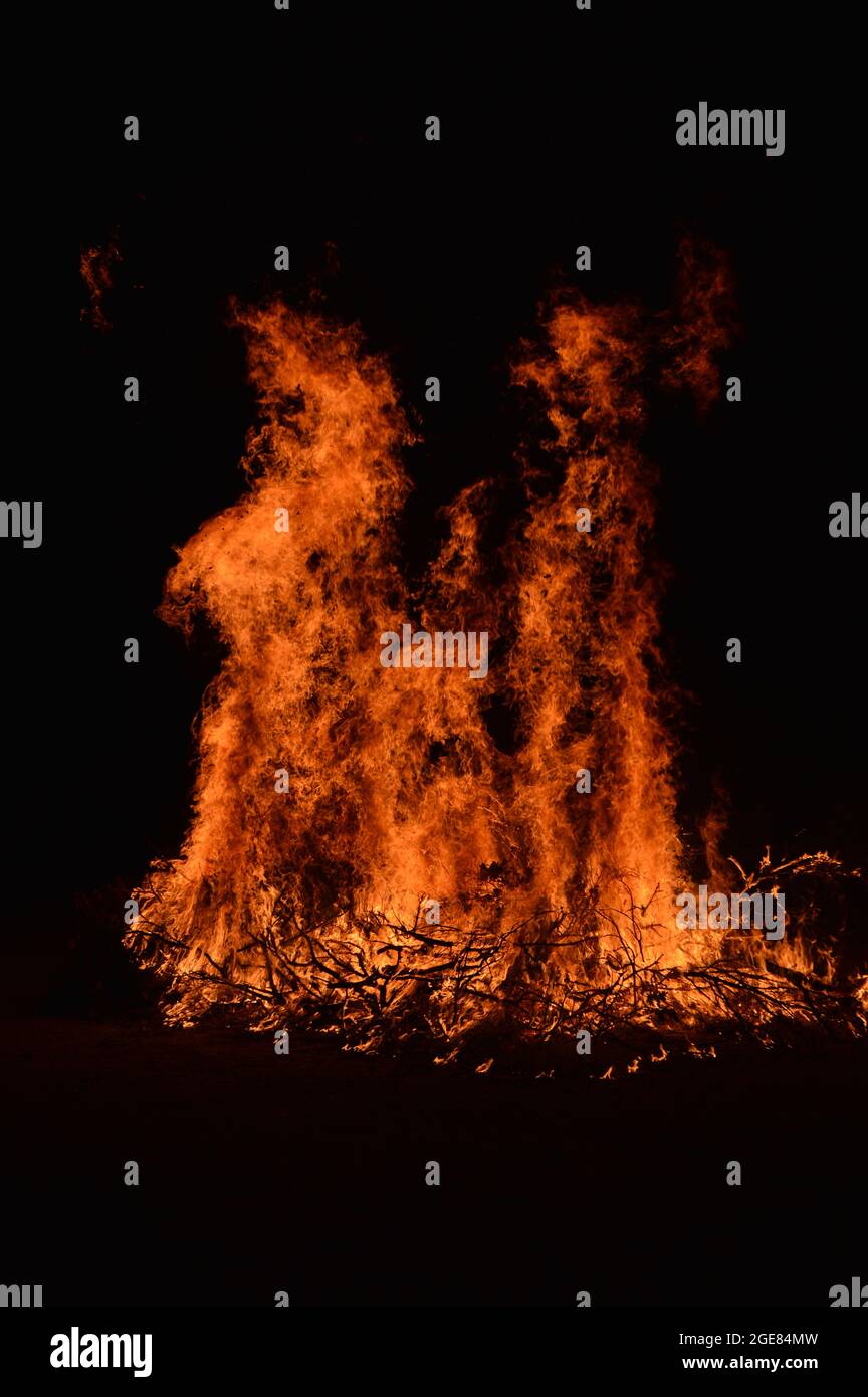 Closeup of fire flames in a darkness Stock Photo - Alamy