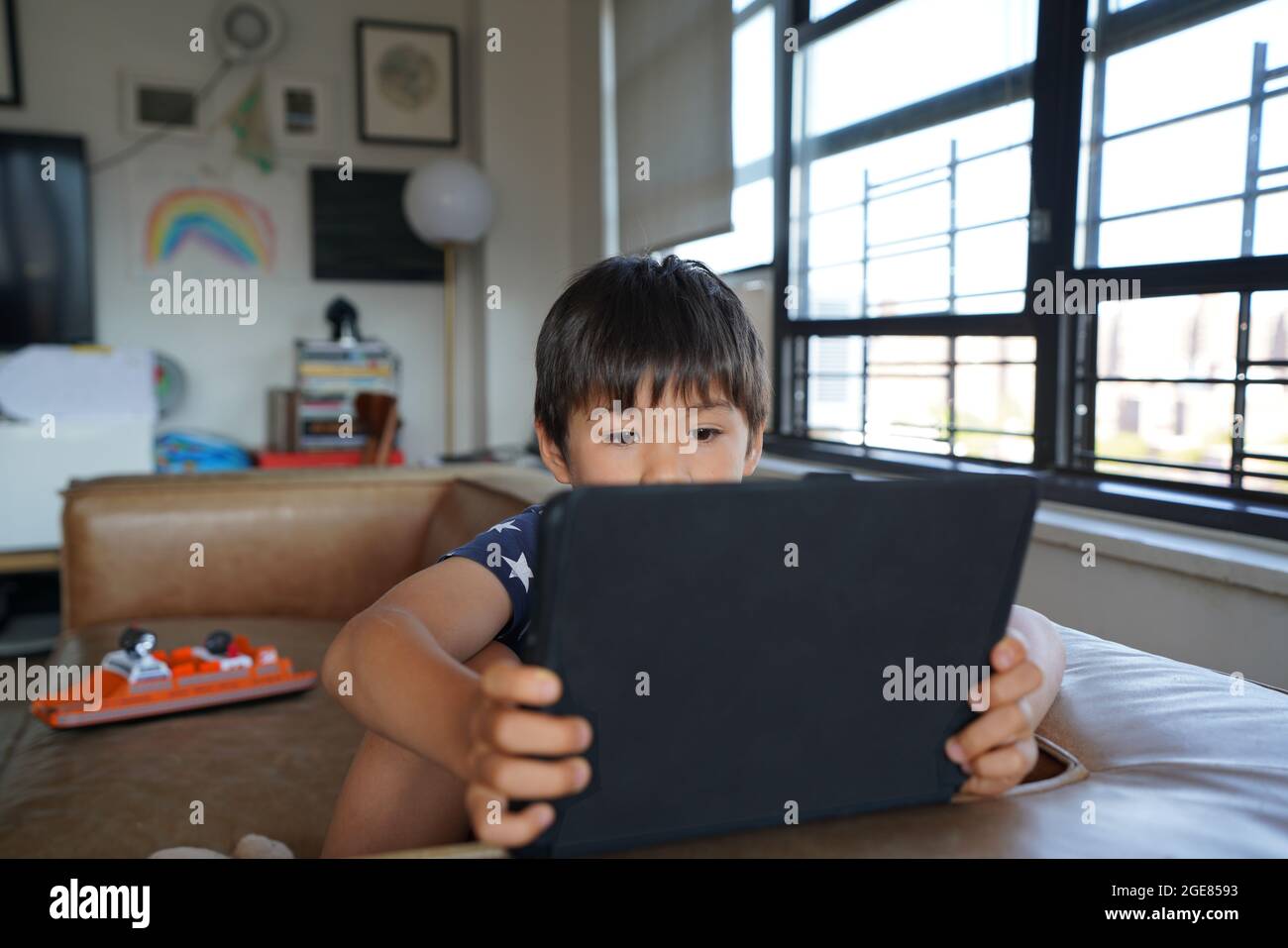 tween on tablet Stock Photo - Alamy