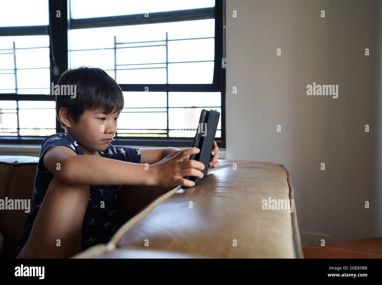 tween on tablet Stock Photo - Alamy