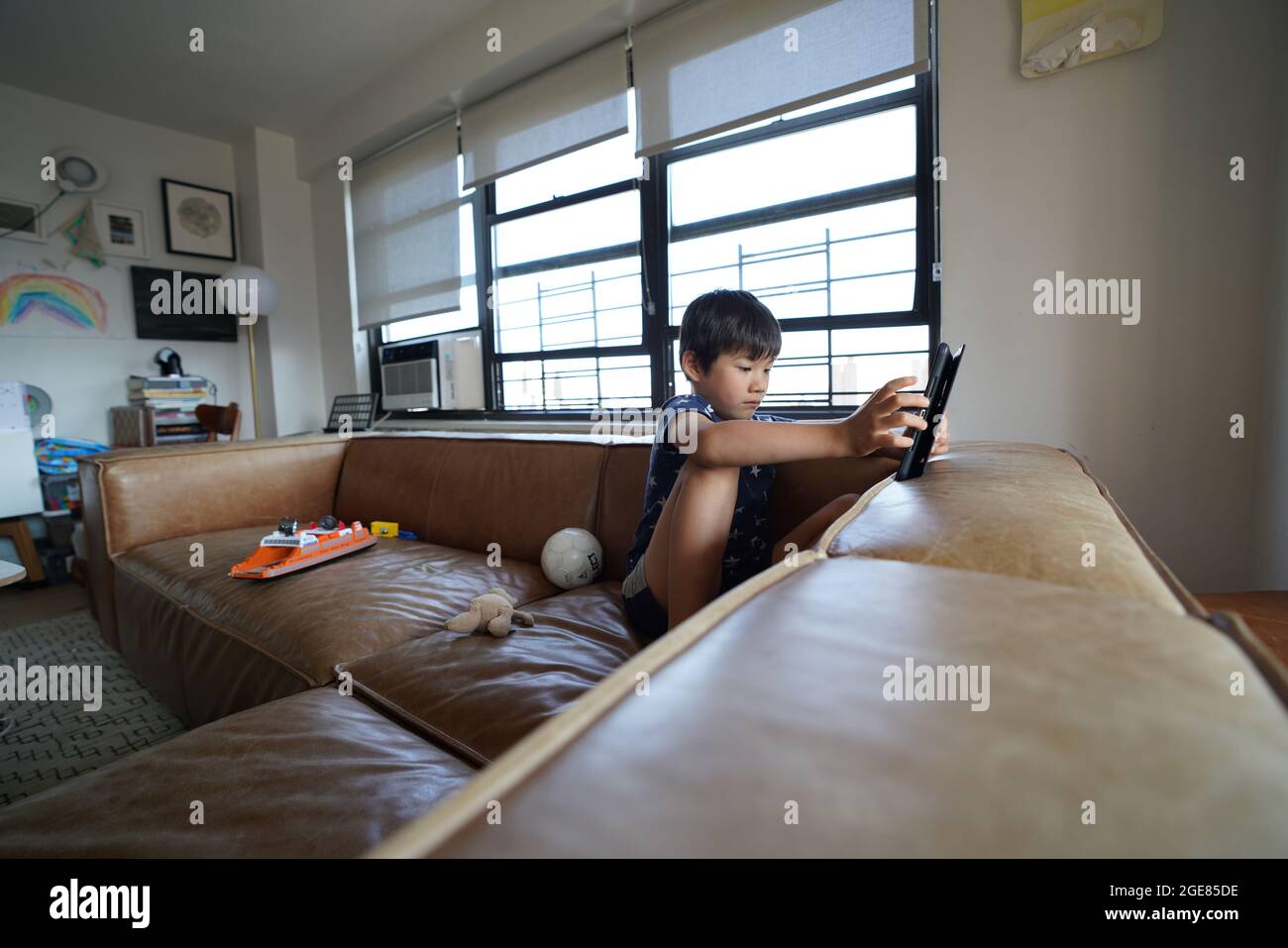 tween on tablet Stock Photo - Alamy