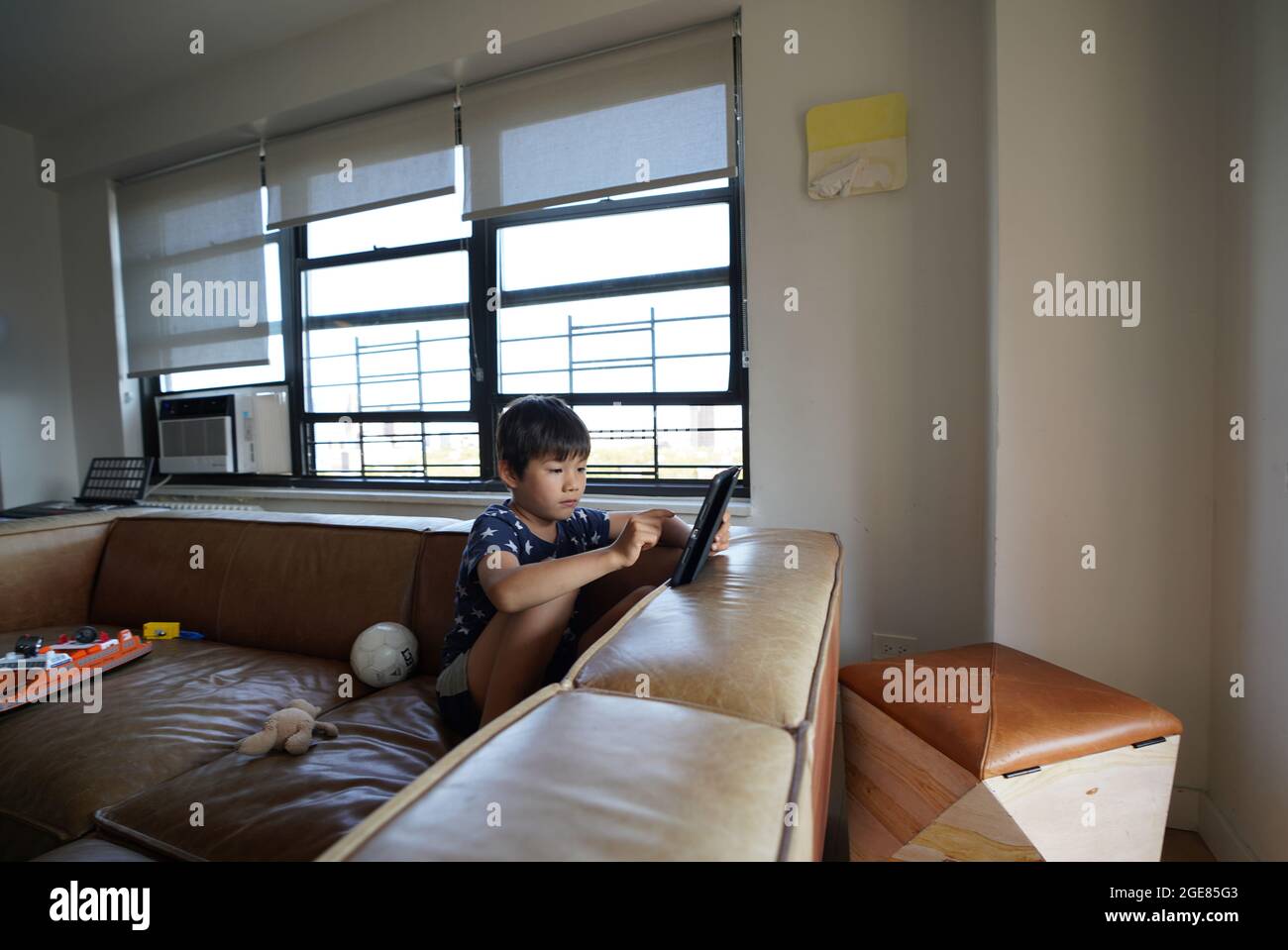 tween on tablet Stock Photo - Alamy